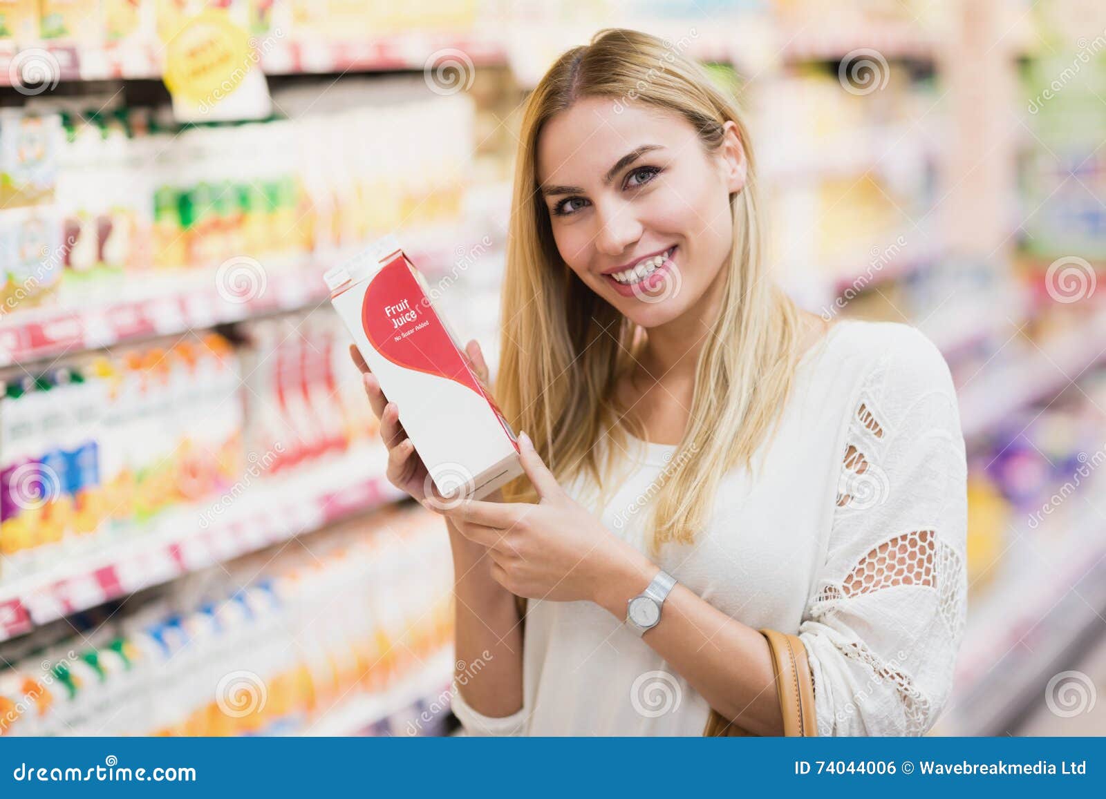 Smiling Customer with a Bottle of Fruit Juice Stock Photo - Image of ...