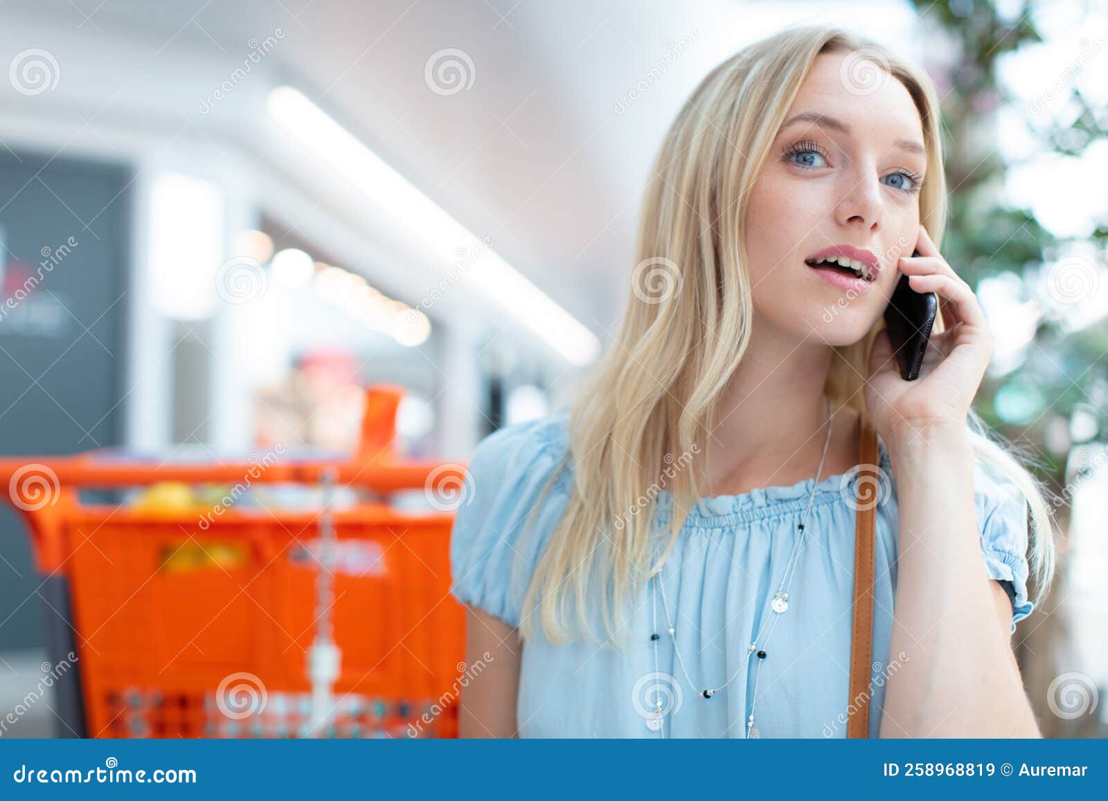 Smiling Customer on Phone Outside Supermarket Stock Image - Image of ...