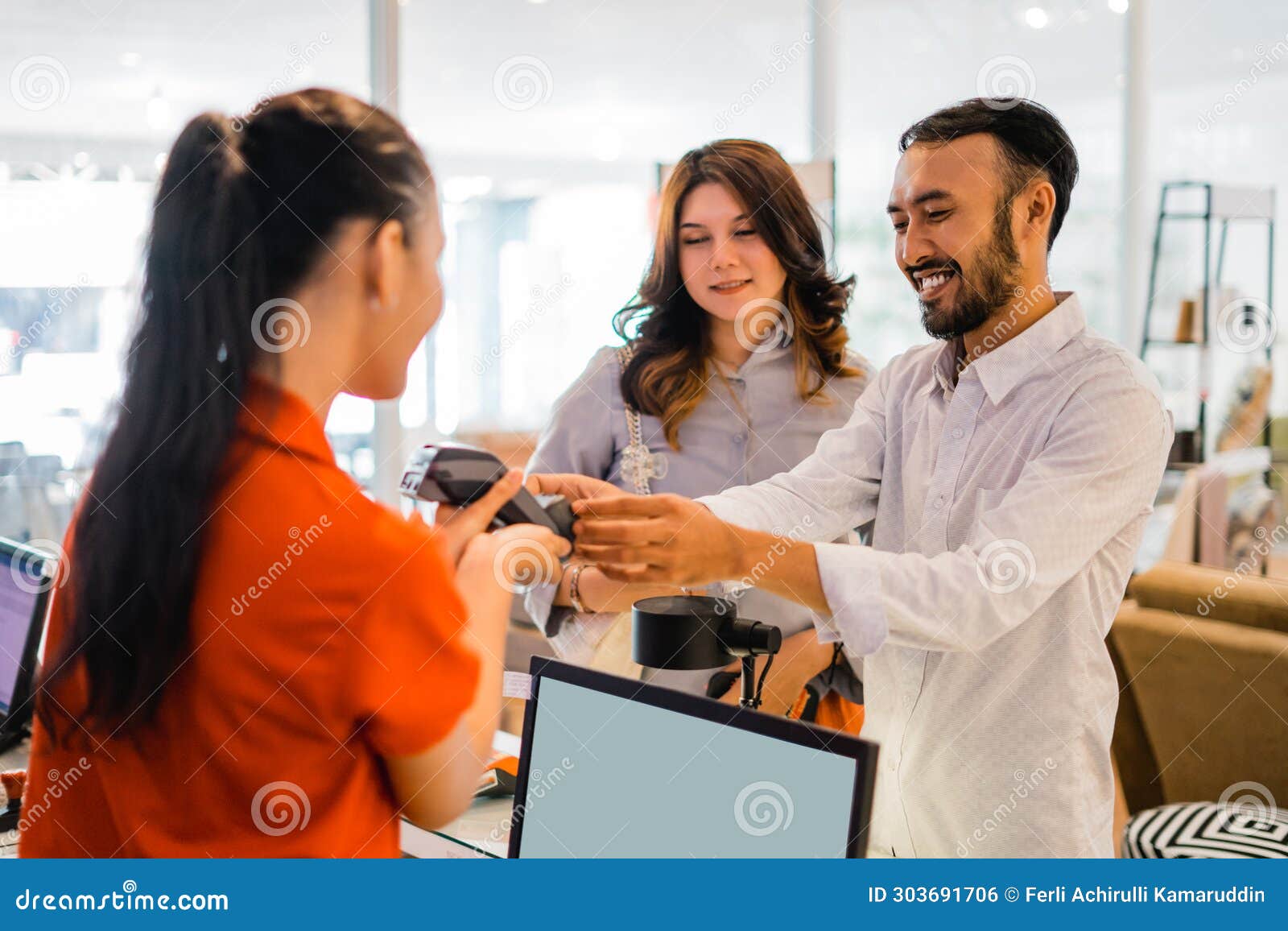 Smiling Customer Man Using EDC Device while Making Payment at the ...