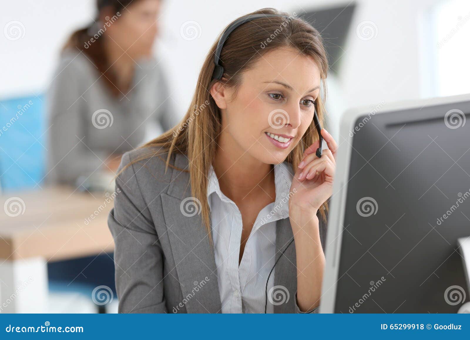 Smiling Customer Service Assistant Working Stock Photo - Image of adult ...