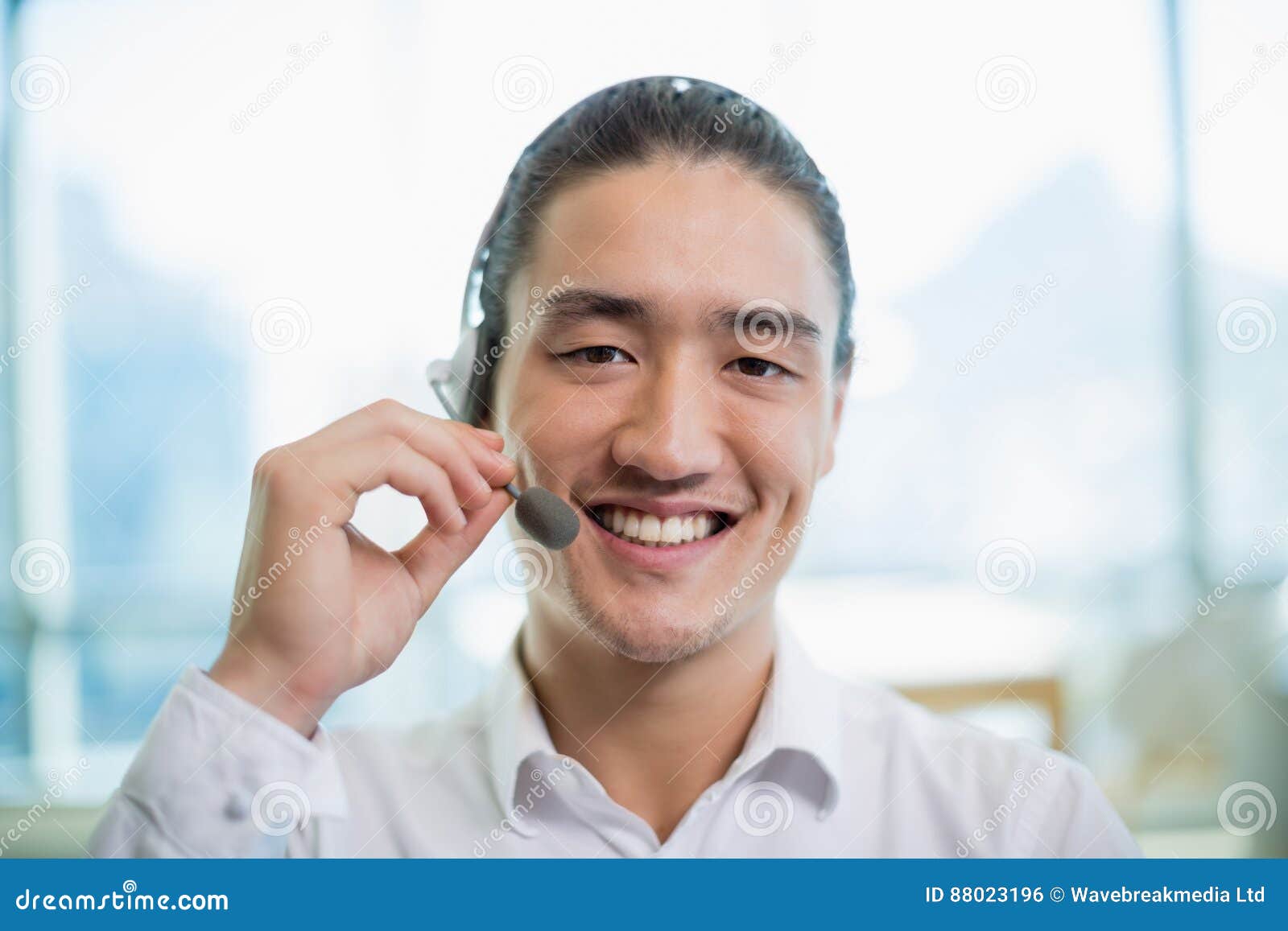 Smiling Customer Service Executive Working in Call Center Stock Photo ...