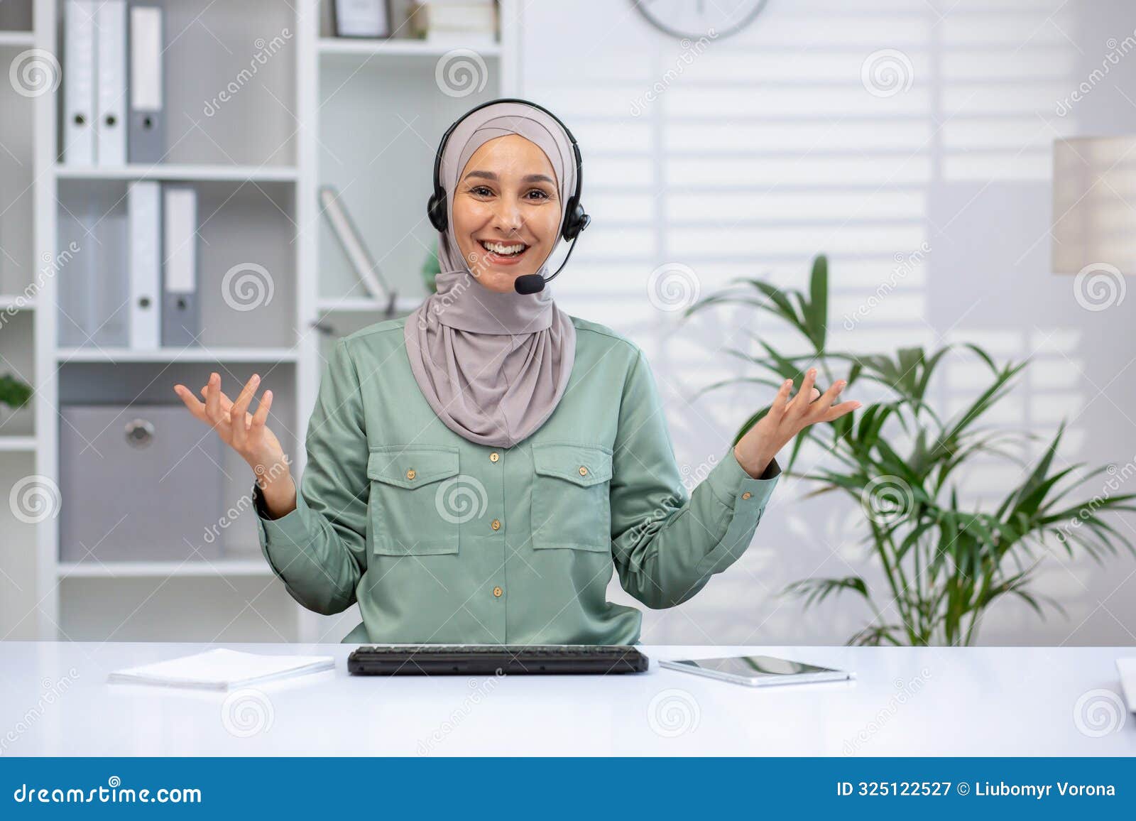 Smiling Customer Service Representative with Headset in Modern Office ...