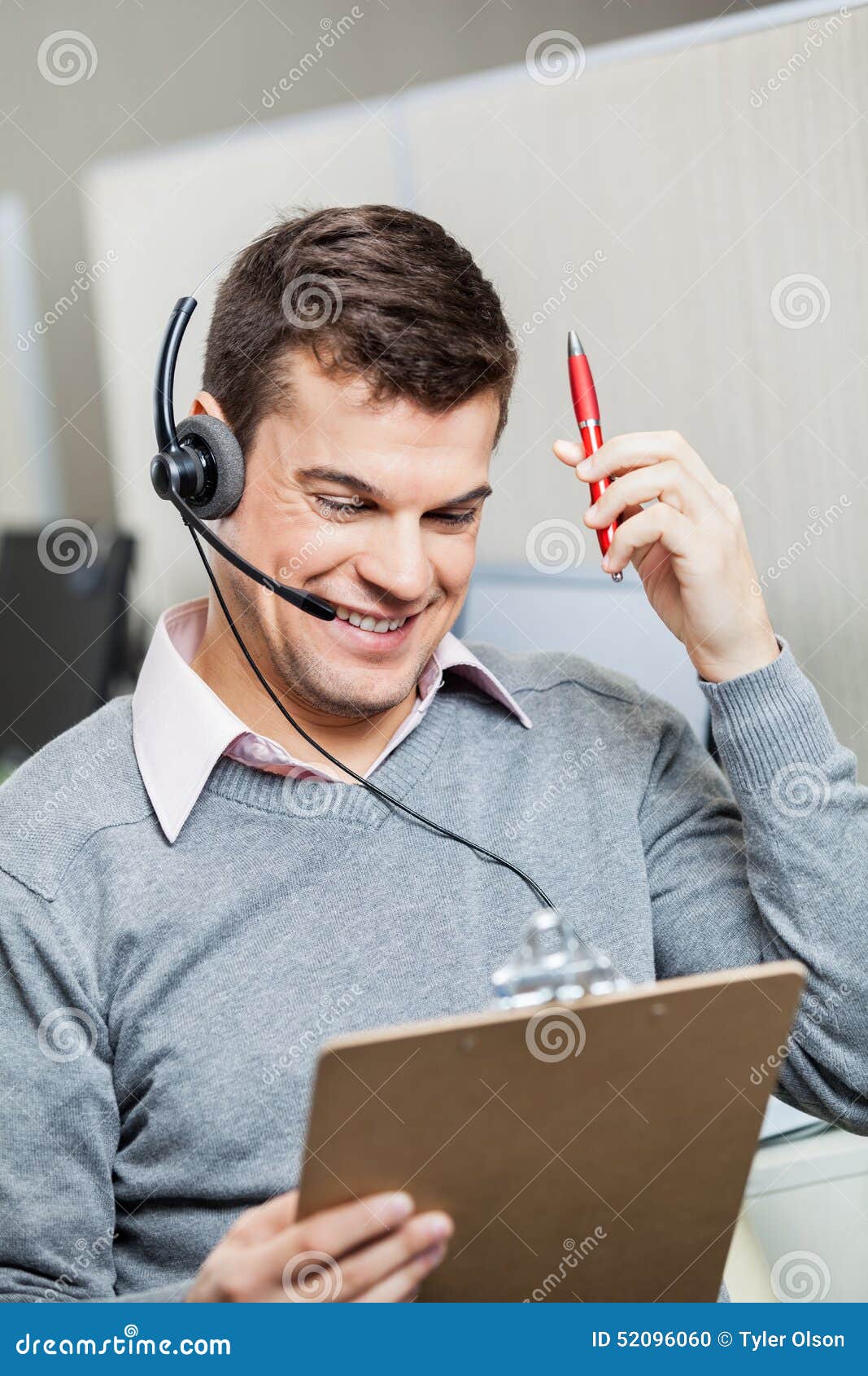 Smiling Customer Service Representative Holding Stock Photo - Image of ...