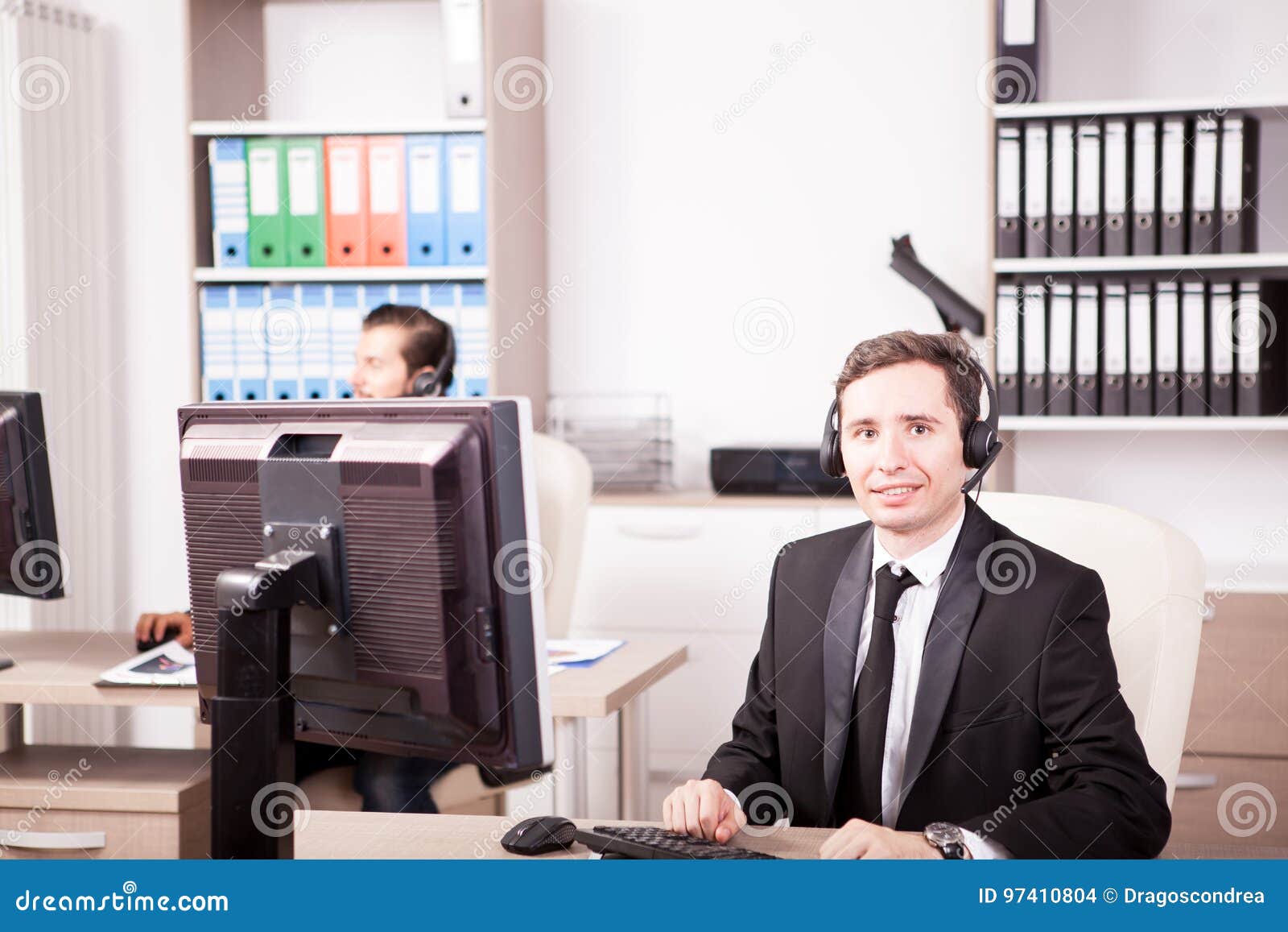 Smiling Customer Service Support Working in the Office Stock Photo ...