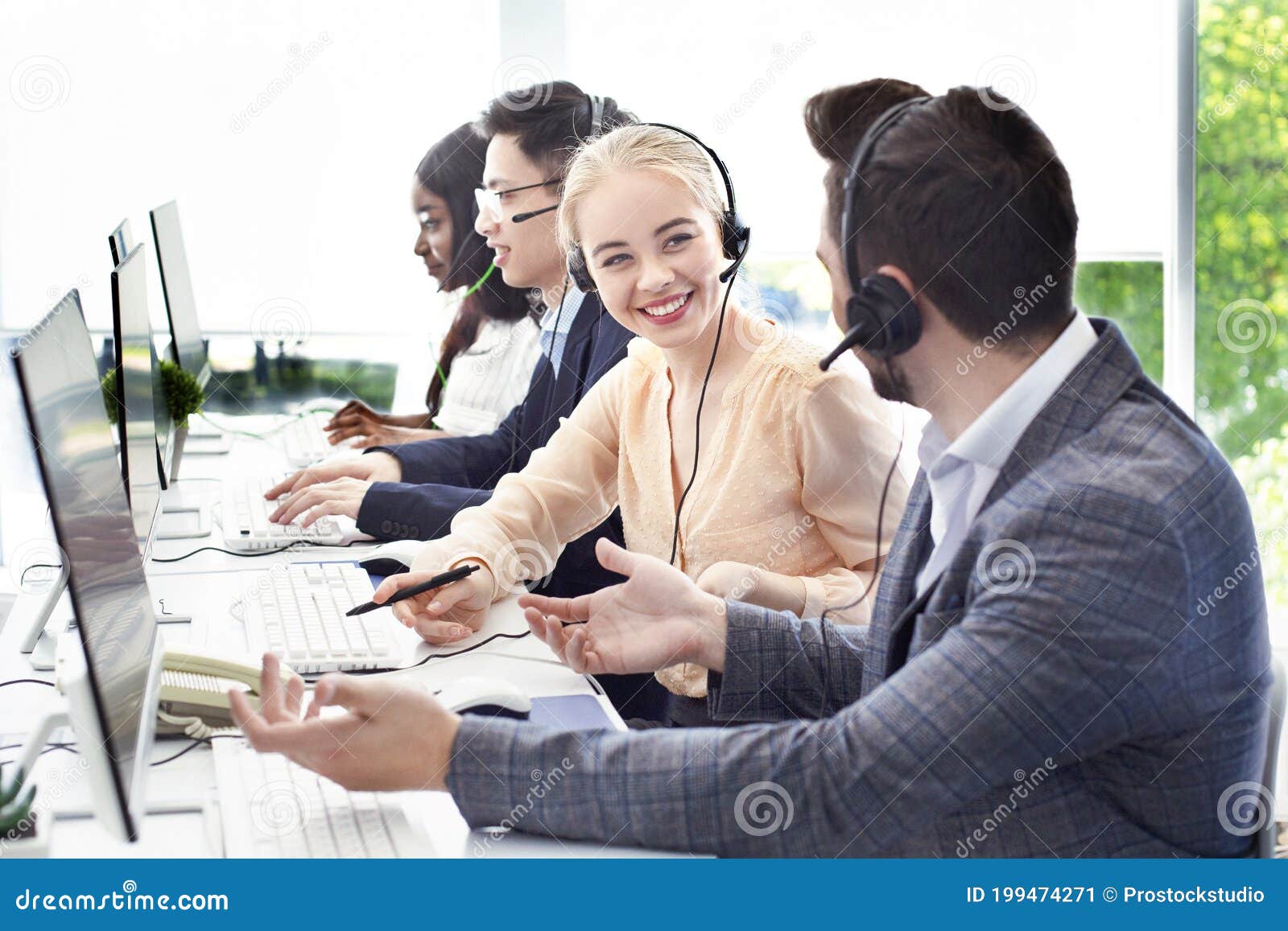 Smiling Customer Support Workers Communicating To Solve Client`s ...