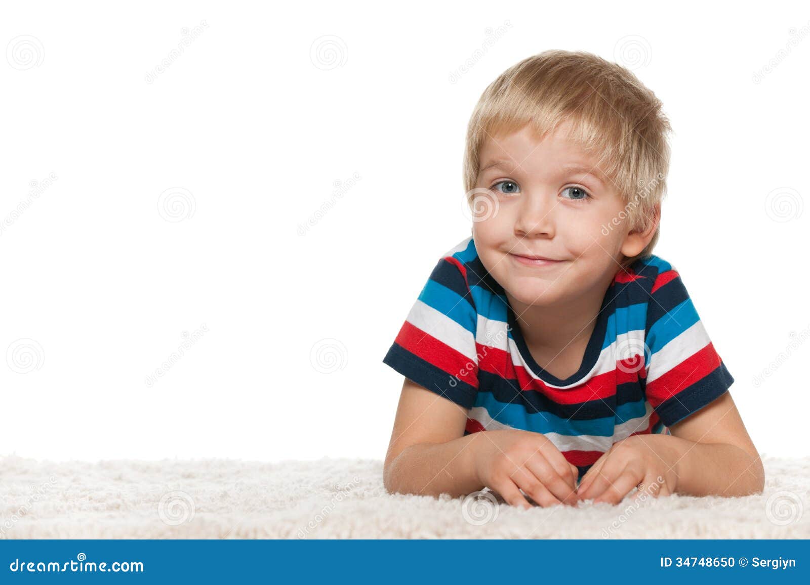 Smiling Cute Boy on the White Carpet Stock Photo - Image of childhood ...