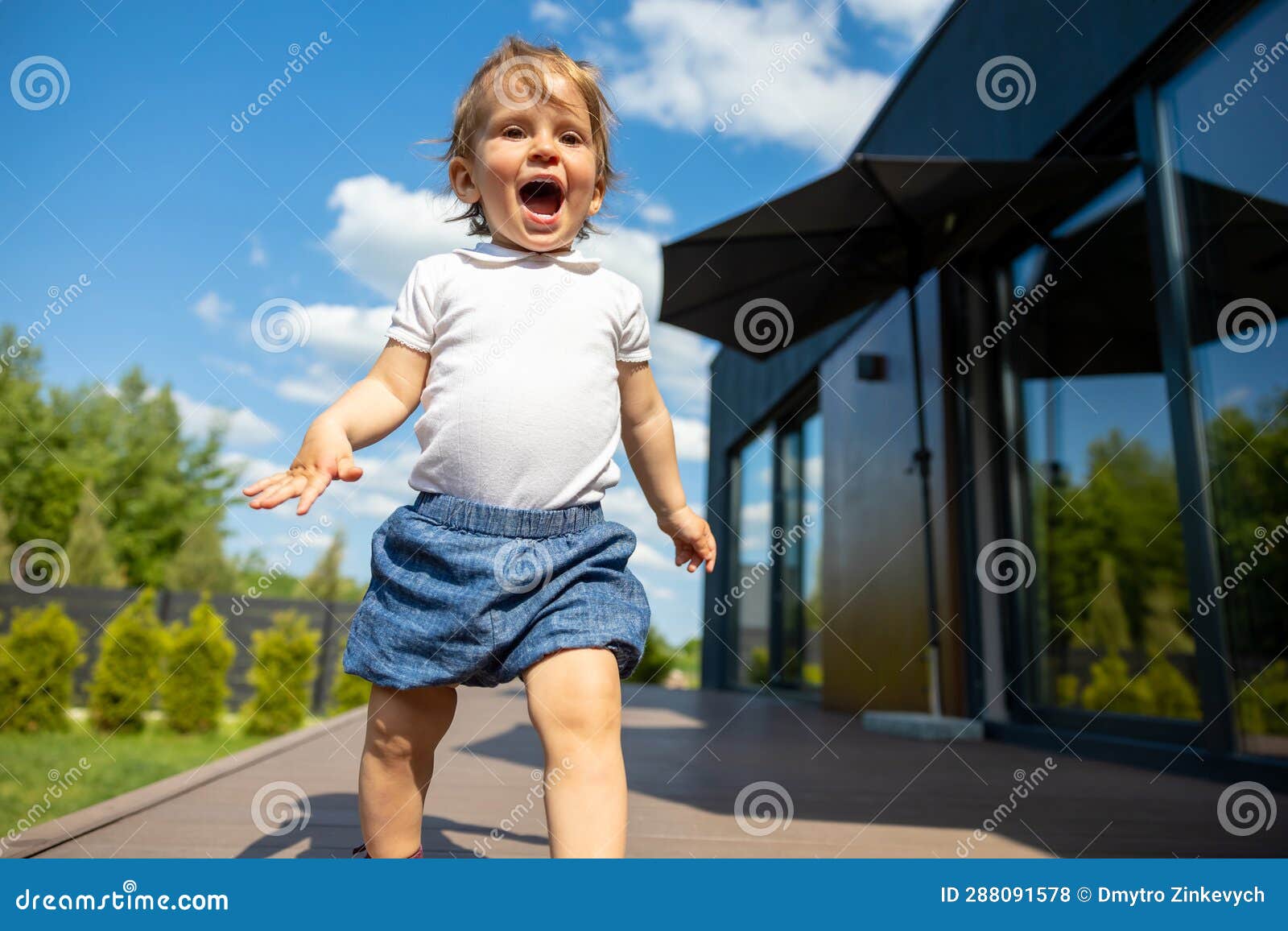 Smiling Cute Kid Walking and Looking Excited Stock Photo - Image of ...