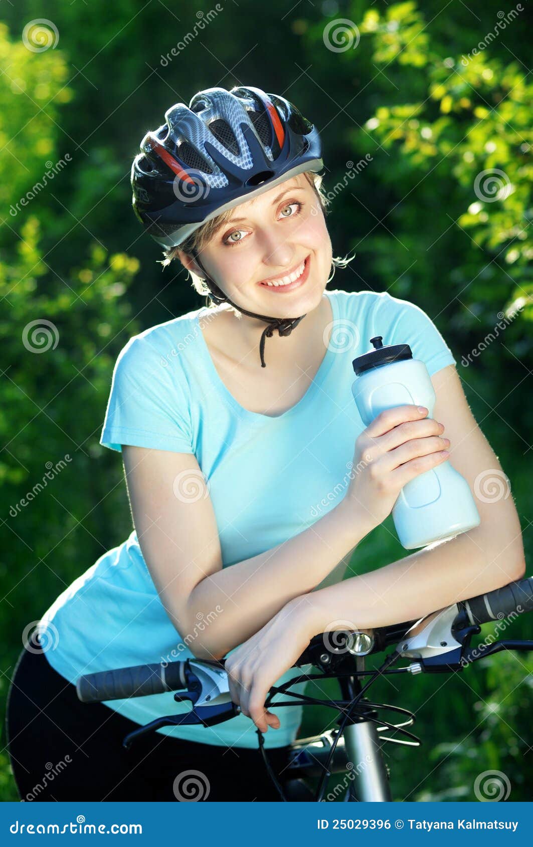 Smiling cyclist girl stock photo. Image of portrait, countryside - 25029396