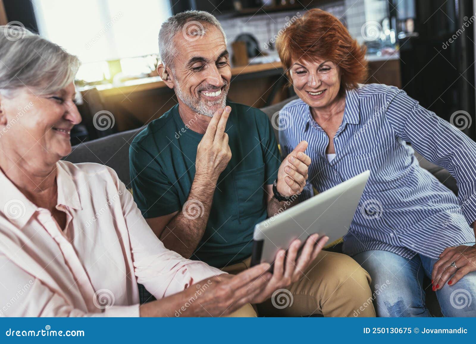 Deaf Man with His Friends Talking Using Sign Language on the Tablets`s ...