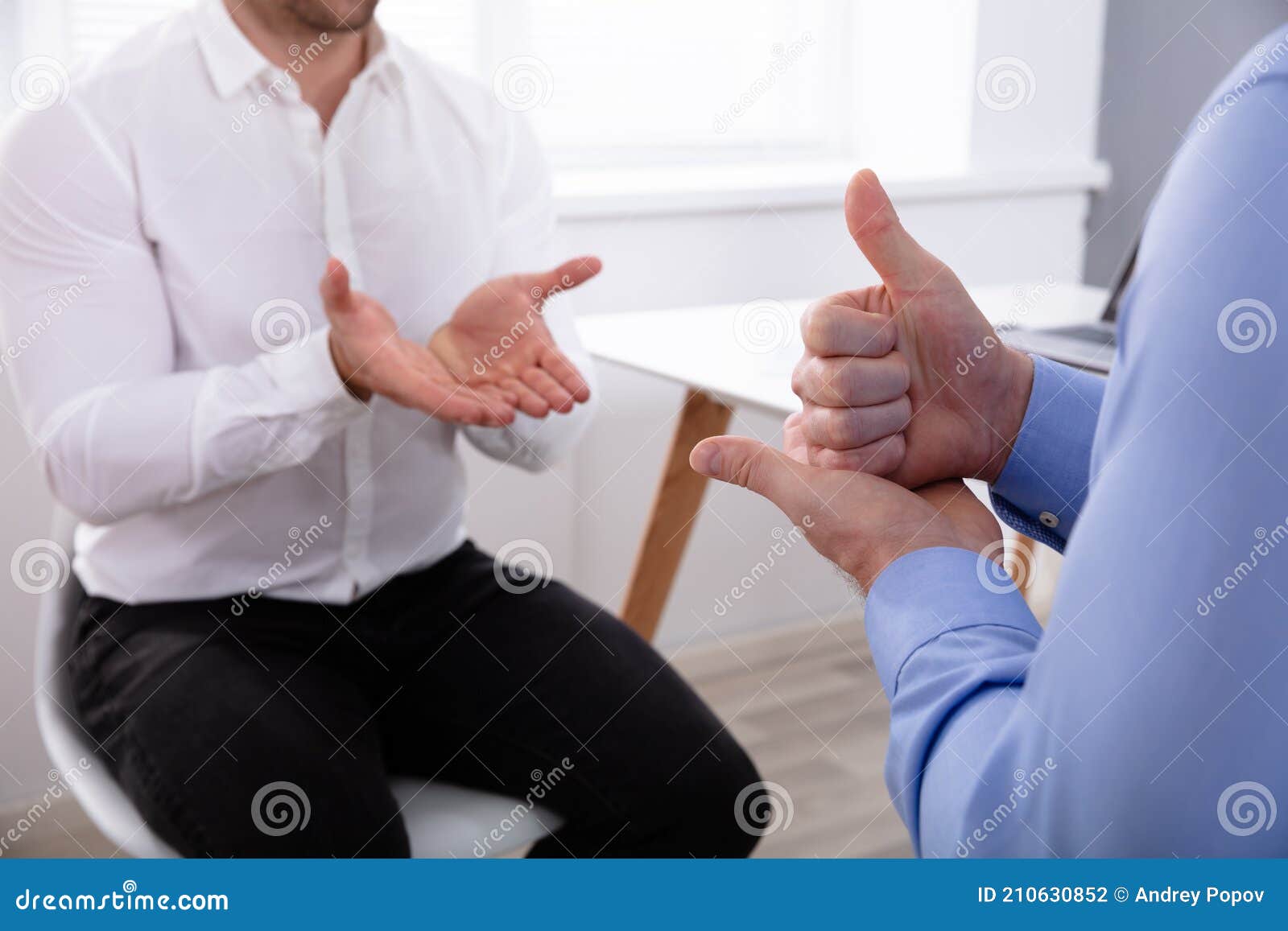 Two People Using Sign Language