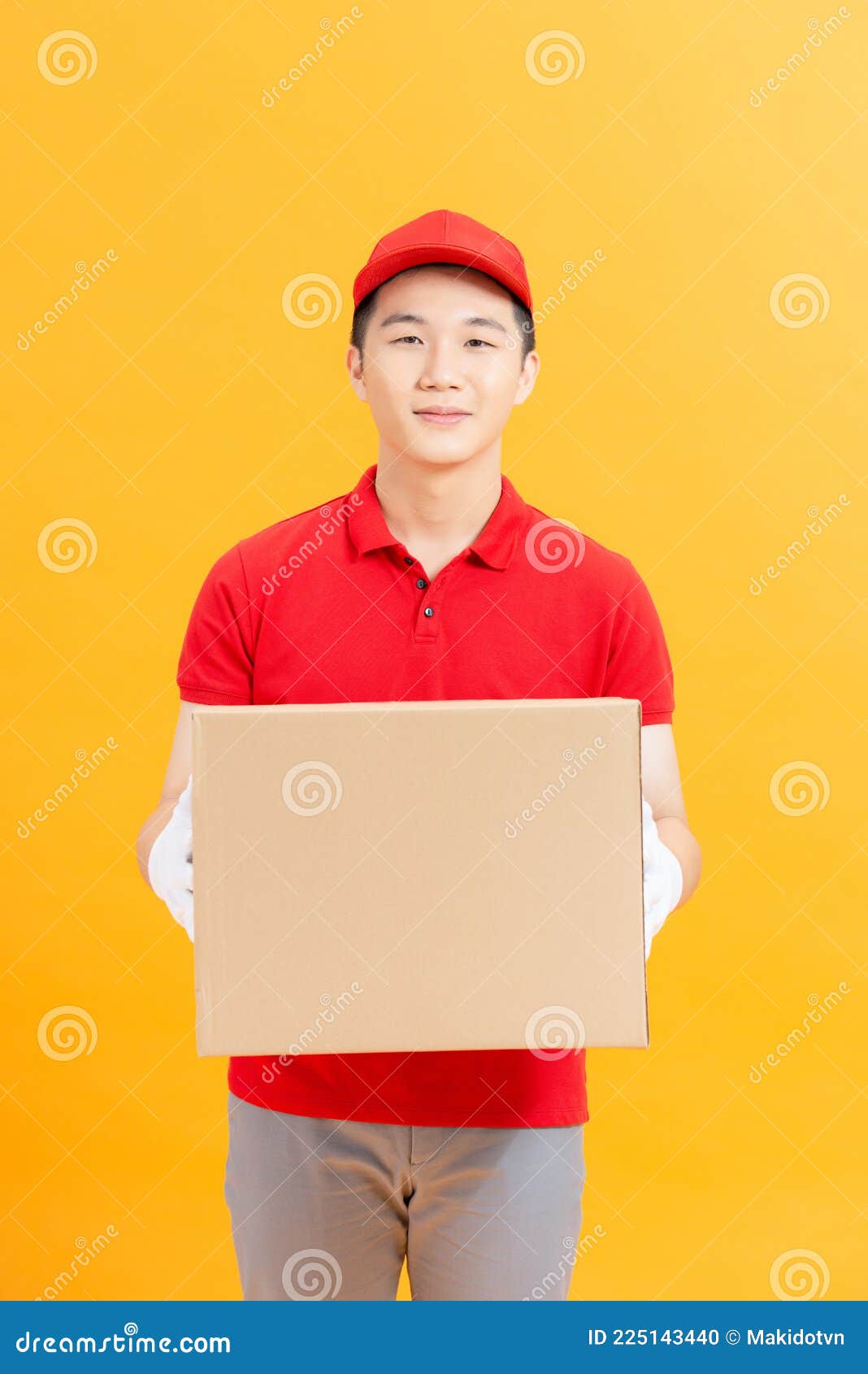 Smiling Delivery Man Carrying a Parcel Box Stock Photo - Image of ...
