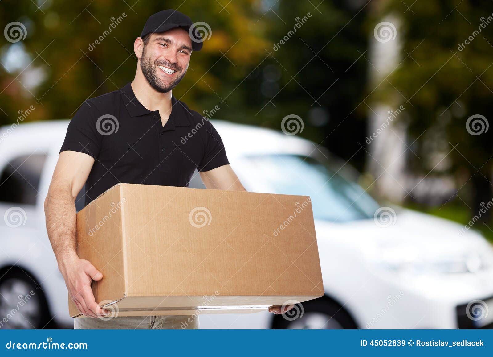 Smiling delivery man stock image. Image of mail, male - 45052839