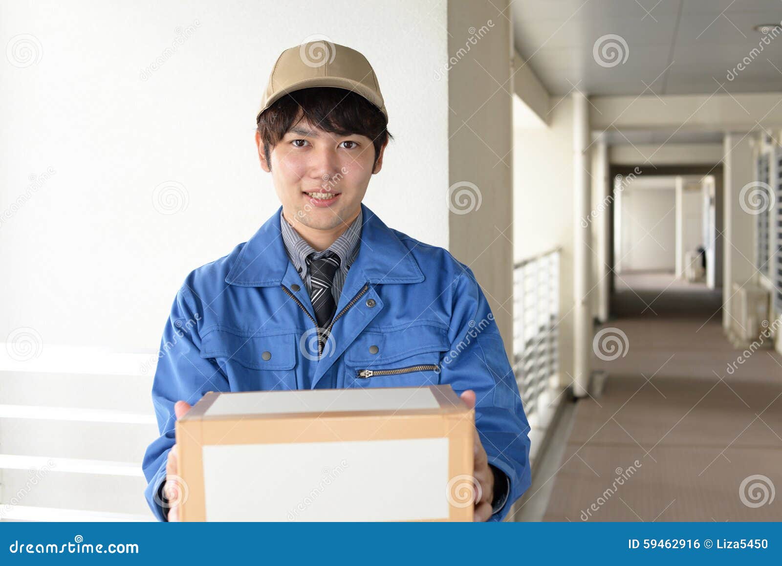 Smiling delivery man stock photo. Image of door, expression - 59462916