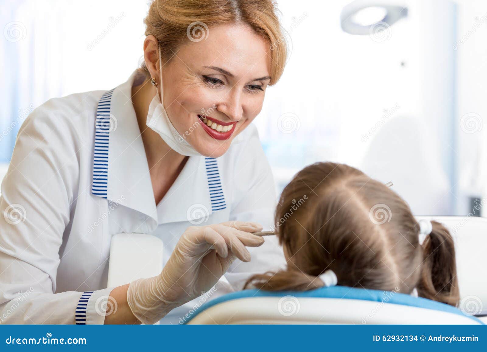 Smiling Dentist Woman Examining Kid Patient in Stock Photo - Image of ... Smiling Dentist Woman Examining Kid Patient in Stock Photo - Image of ...