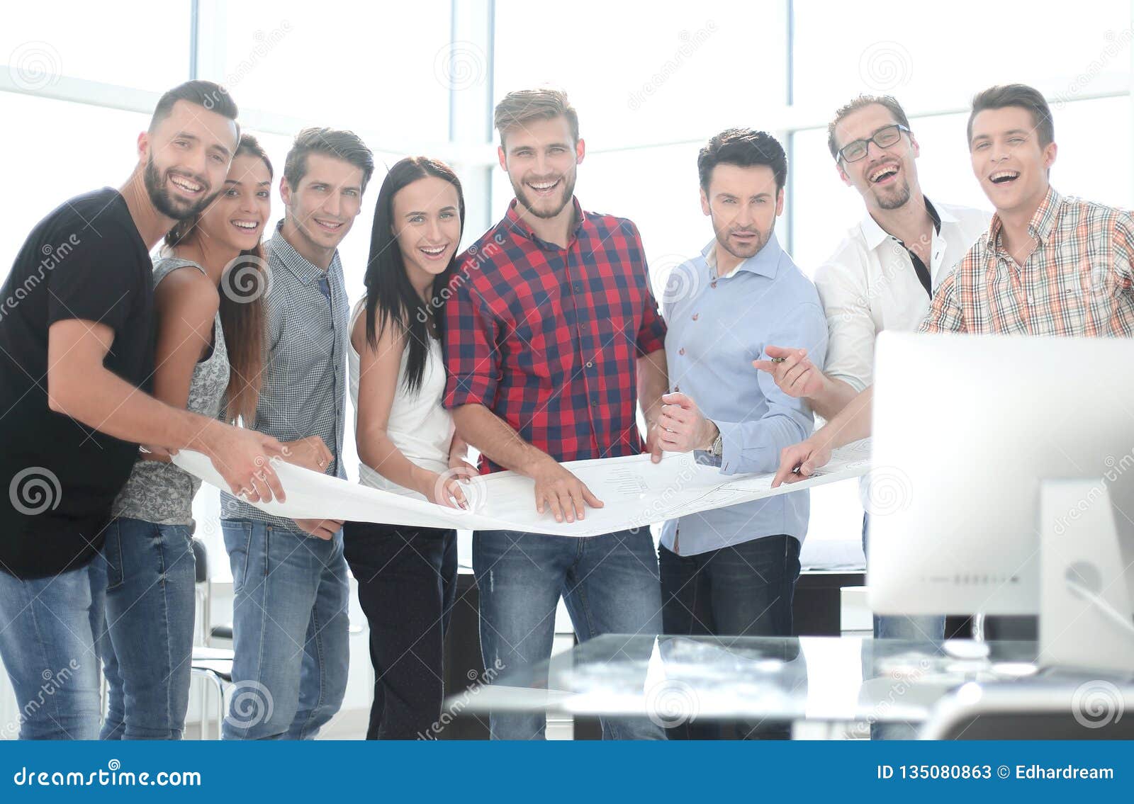 Smiling Design Team Standing in the Office Stock Image - Image of group ...