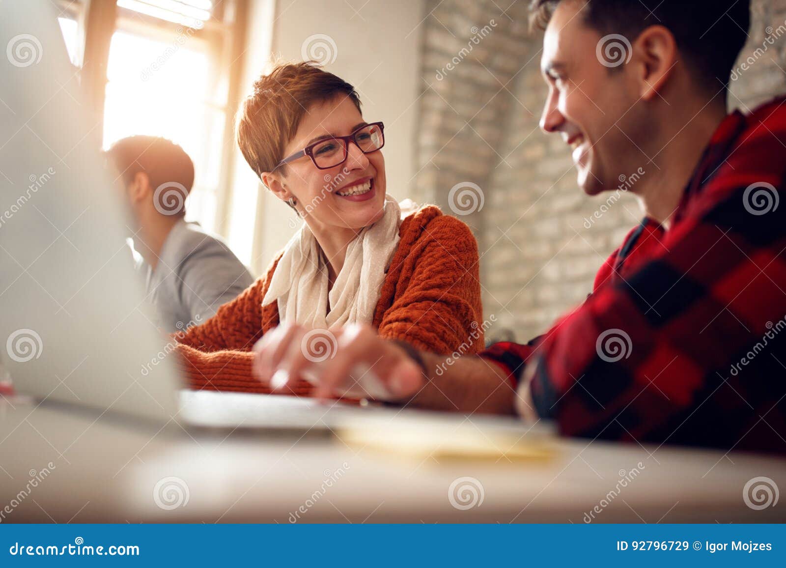 Smiling Designers in Good Mood Working Together Stock Image - Image of ... Smiling Designers in Good Mood Working Together Stock Image - Image of ...