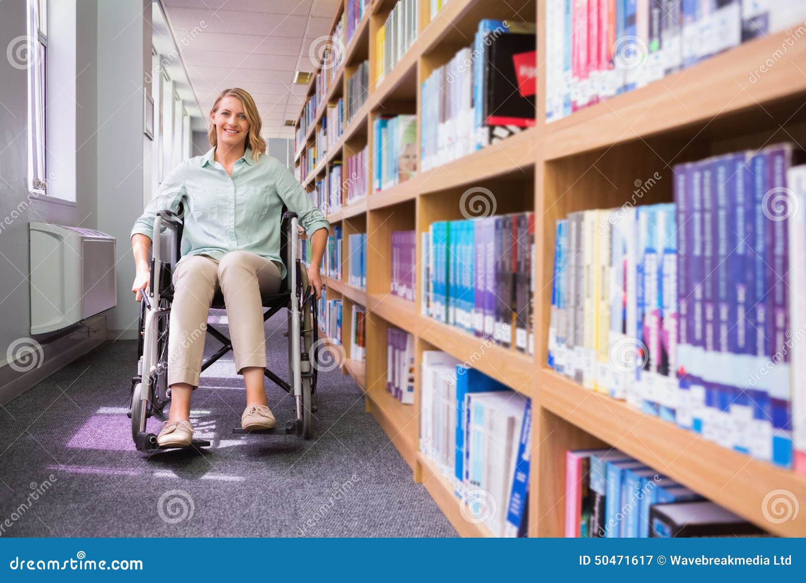 Smiling Disabled Student in Library Stock Image - Image of young ...