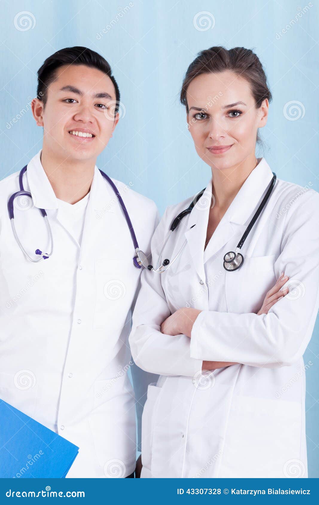 Smiling diverse doctors stock photo. Image of documents - 43307328