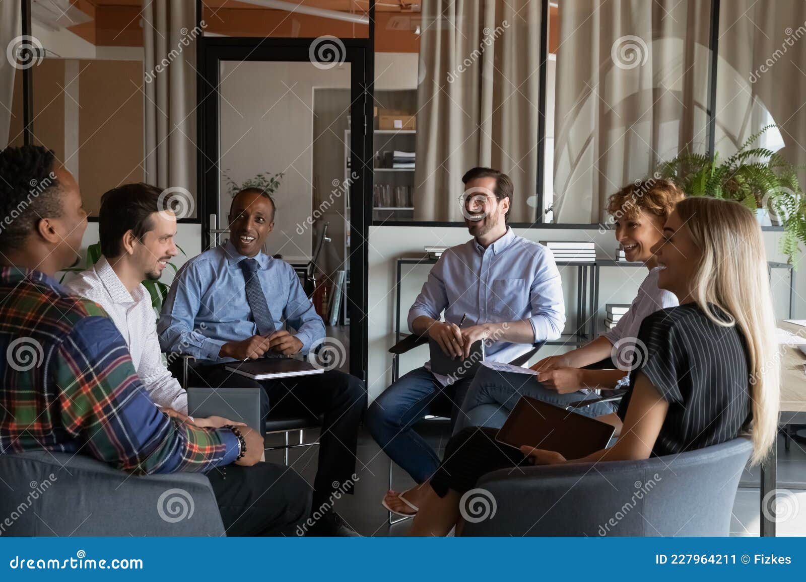 Smiling Diverse Employees Laugh at Team Office Meeting Stock Image ... Smiling Diverse Employees Laugh at Team Office Meeting Stock Image ...