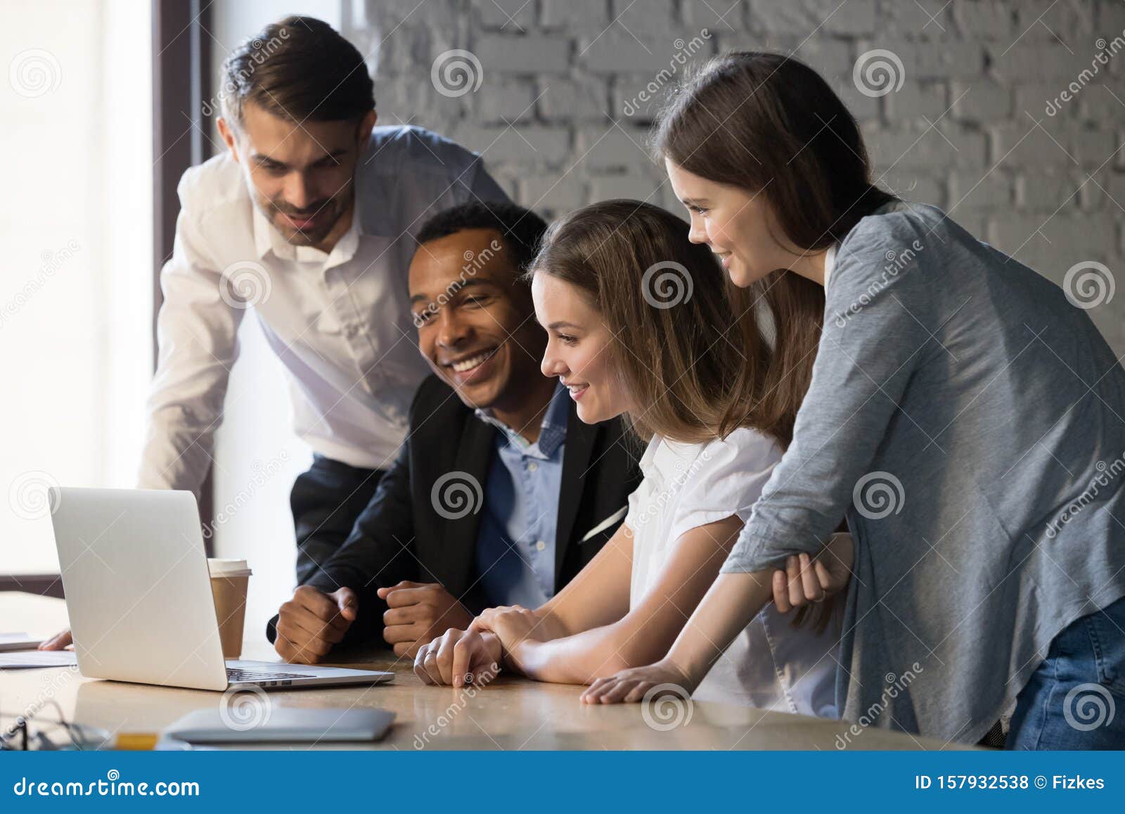 Smiling Diverse Employees Team Watching Webinar on Laptop Together ... Smiling Diverse Employees Team Watching Webinar on Laptop Together ...