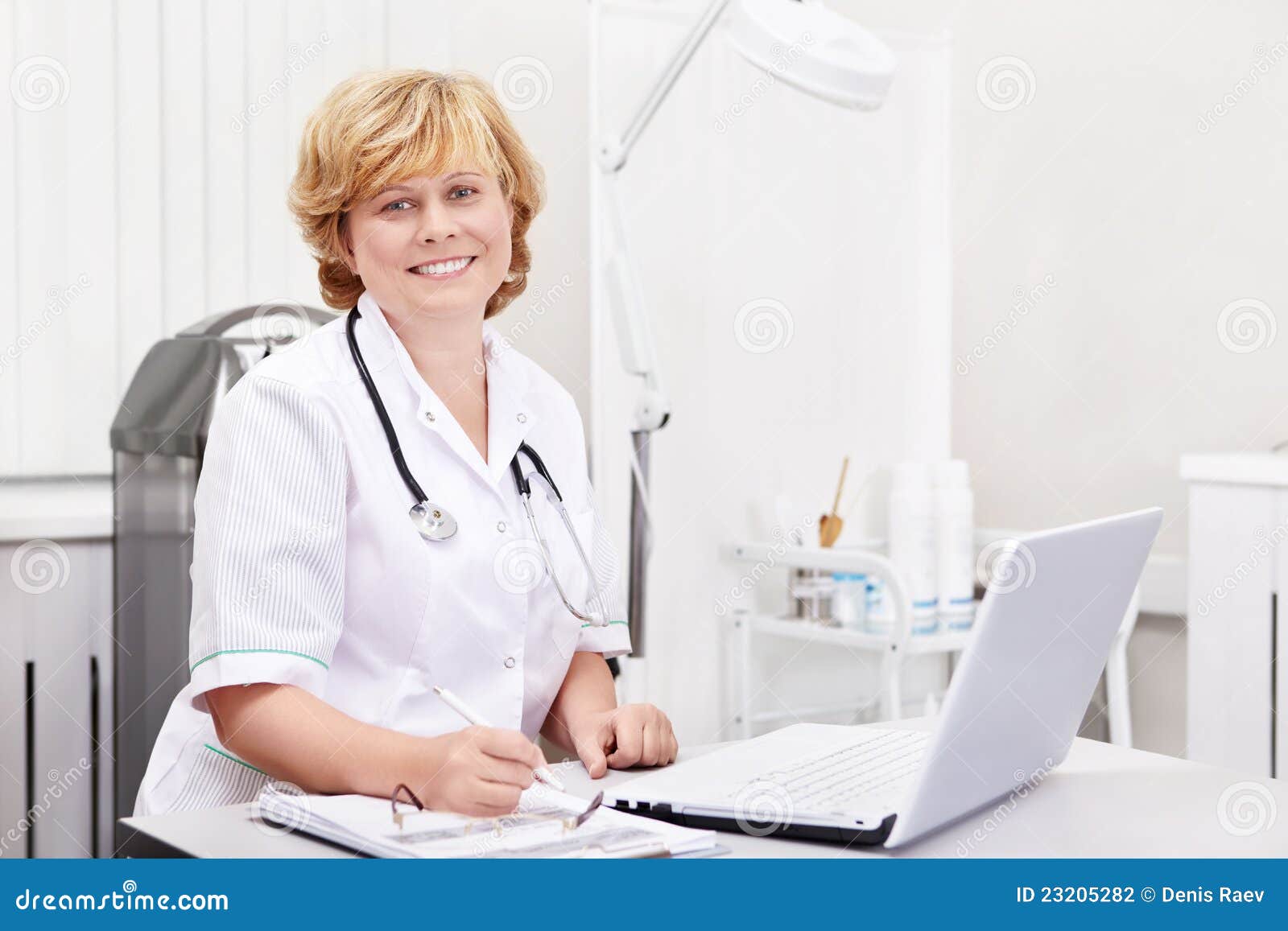 Smiling doctor stock photo. Image of practitioner, technology - 23205282