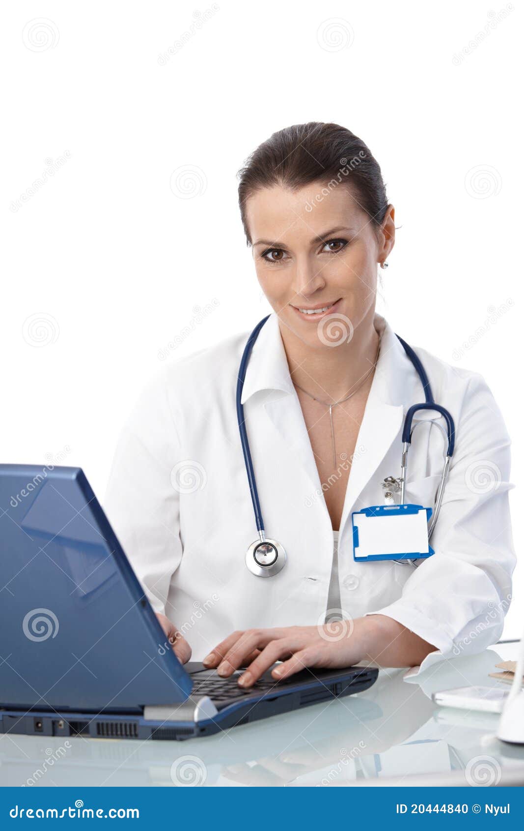 Smiling Doctor with Computer Stock Photo - Image of expertise, casual ...