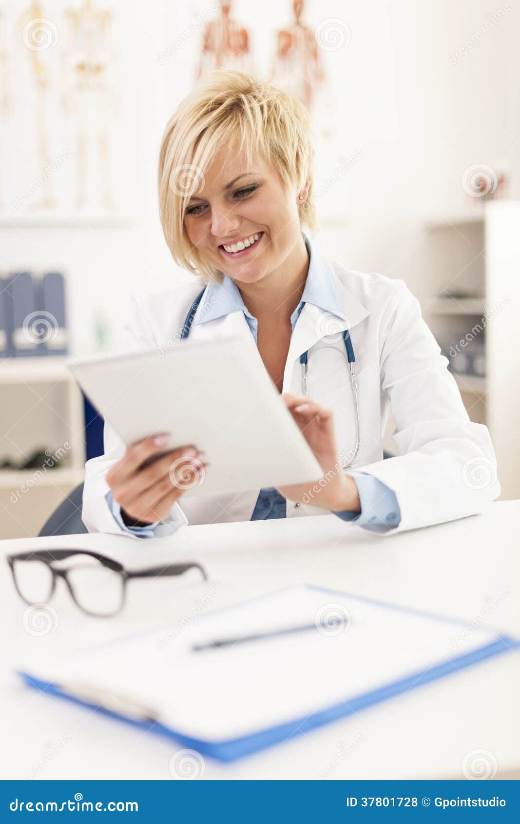 Smiling Doctor at Her Office Stock Photo - Image of medicine, tablet ...
