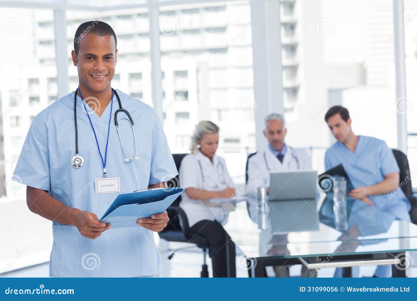 Smiling Doctor Holding File Stock Photo - Image of cheerful, looking ...