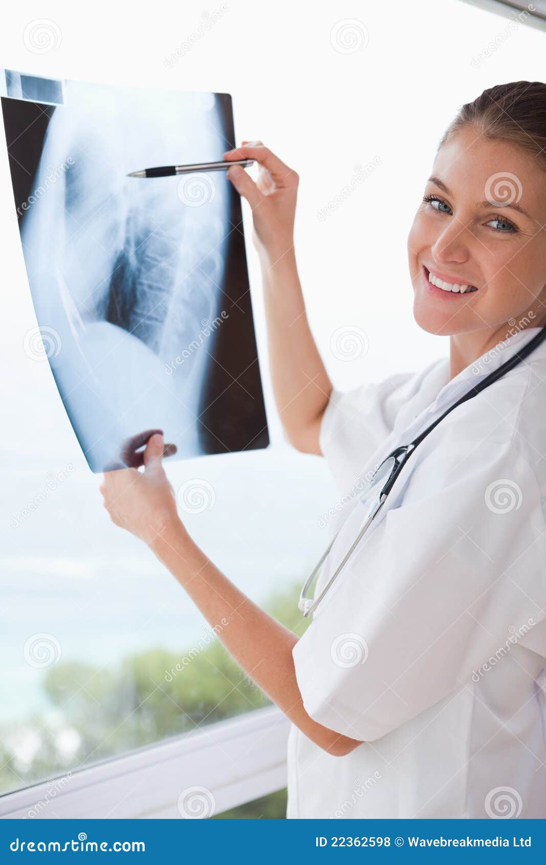 Smiling doctor with x-ray stock photo. Image of radiologist - 22362598