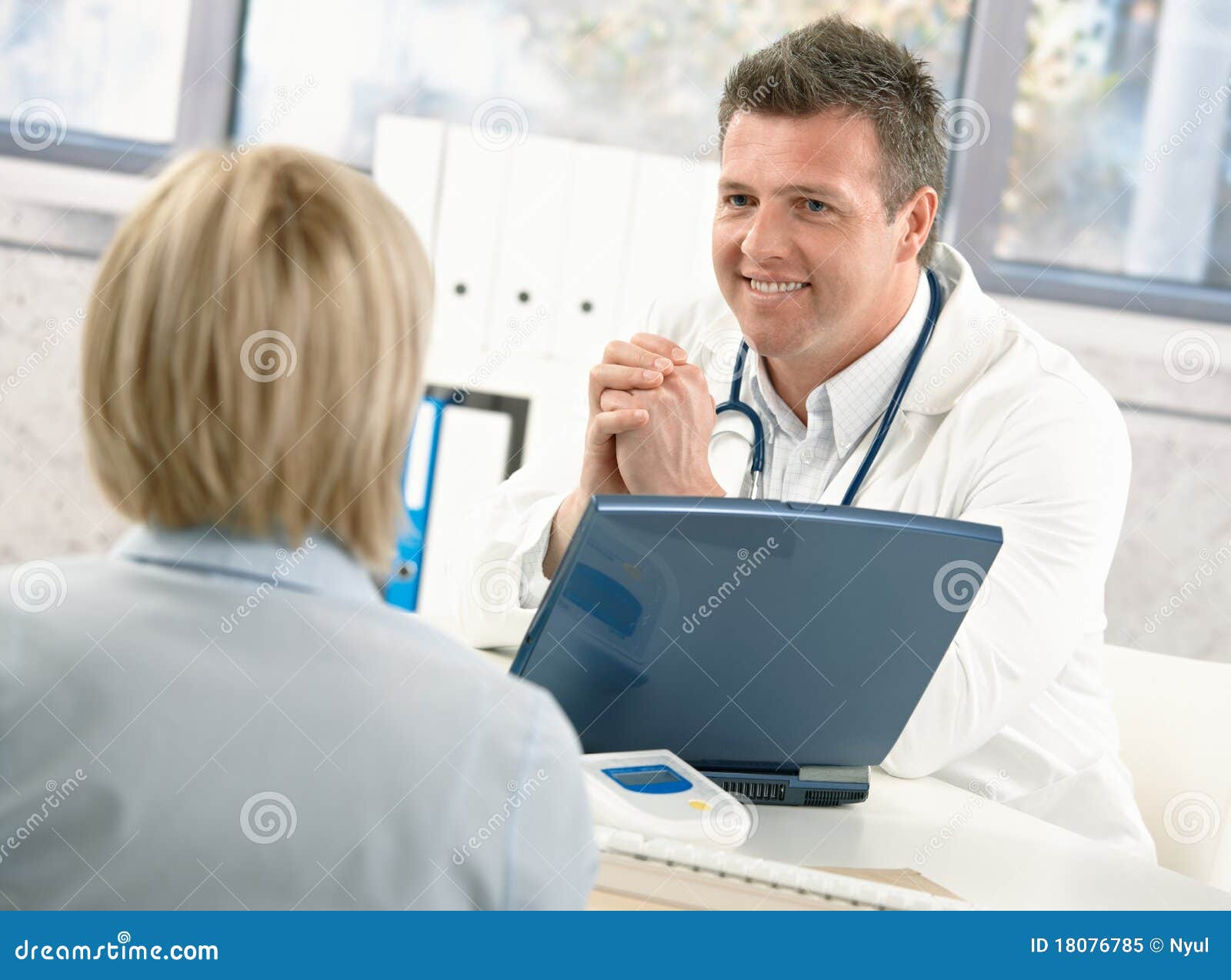 Smiling Doctor Talking To Patient Stock Image - Image of heal, adult ...