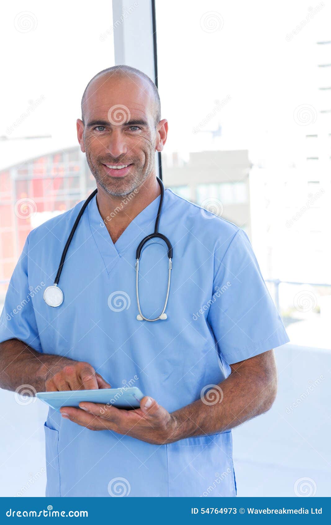 Smiling Doctor Using Tablet Computer Stock Image - Image of mature ...