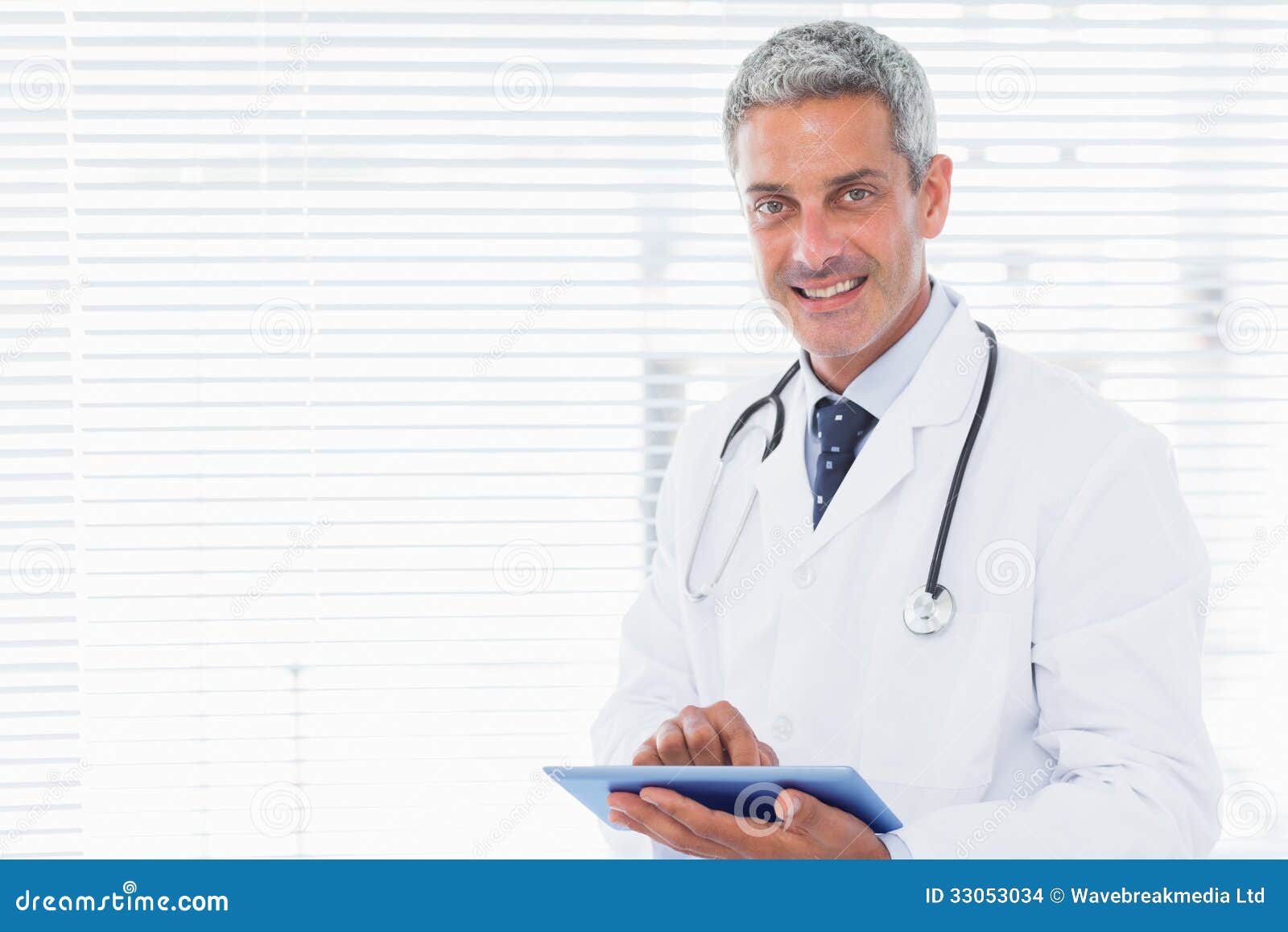 Smiling Doctor Using Tablet Pc Stock Photo - Image of room, hair: 33053034