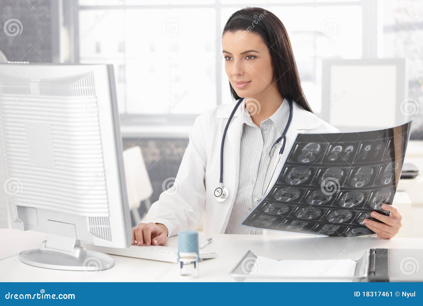 Smiling Doctor Working at Desk Stock Image - Image of doctors, health ...