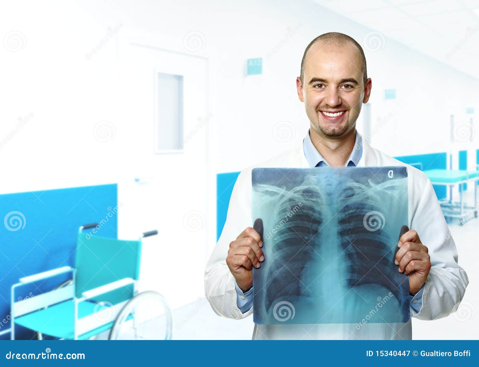 Smiling doctor with xray stock image. Image of hospital - 15340447