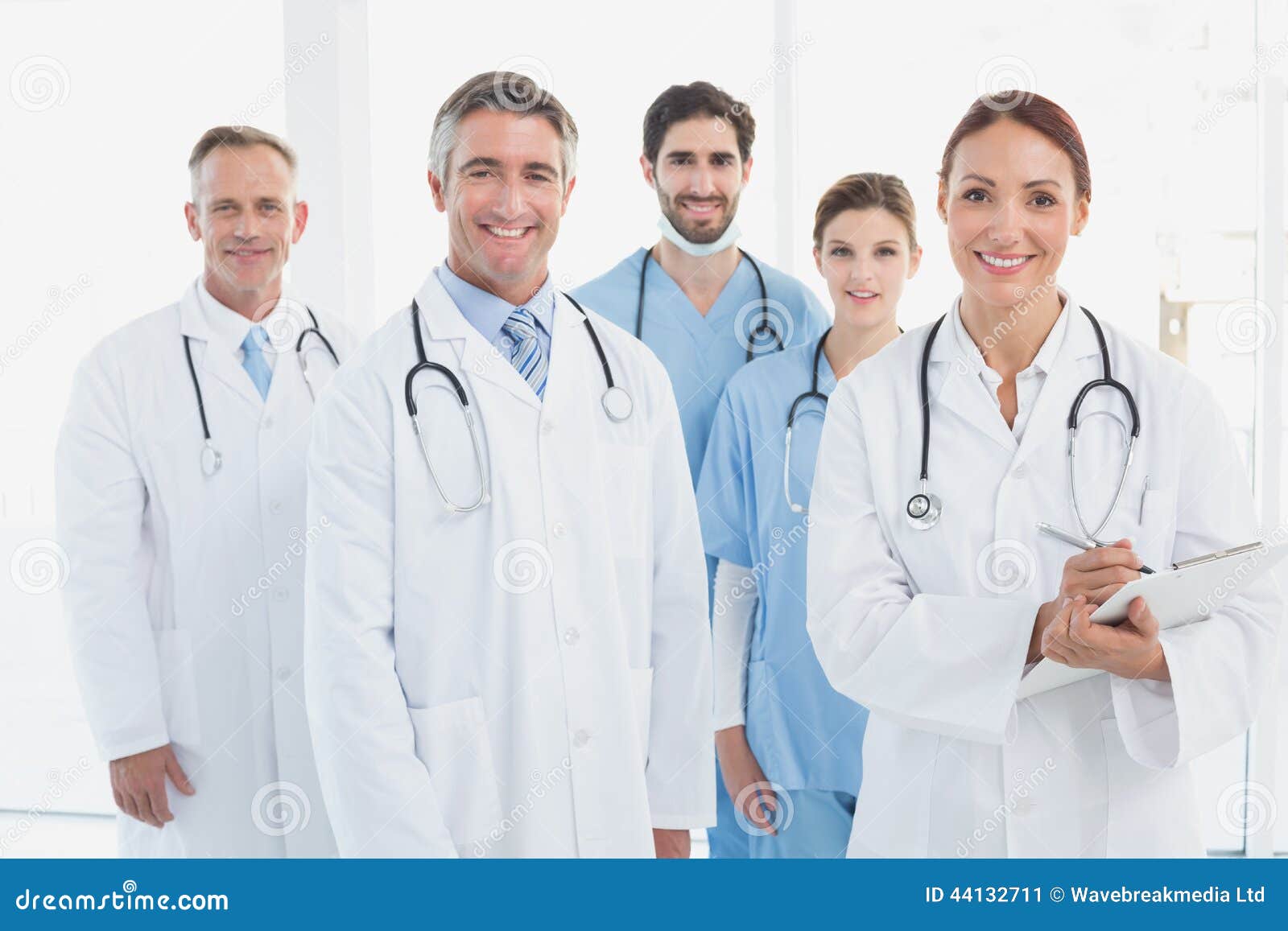Smiling Doctors All Standing Together Stock Image - Image of quarter ...