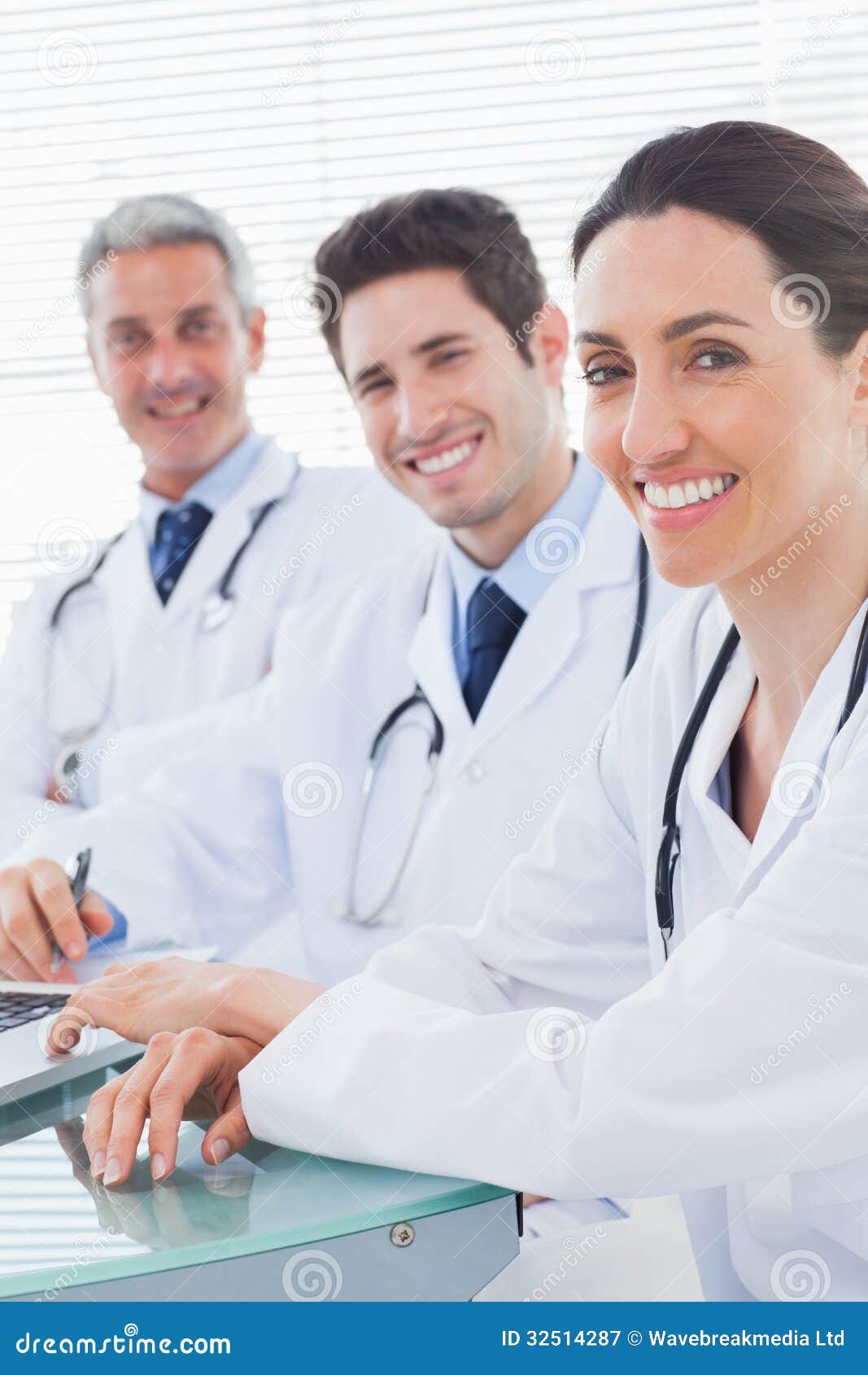 Smiling Doctors Looking at Camera Stock Image - Image of happy, clinic ...