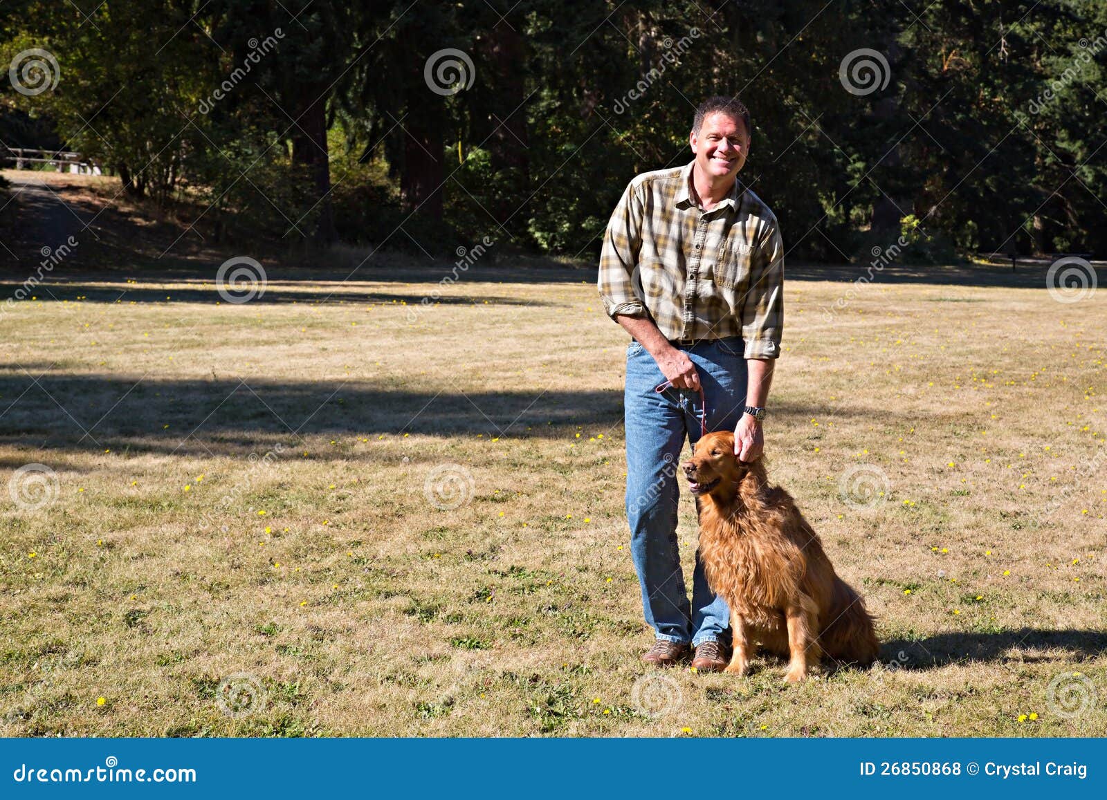 Smiling Dog Owner at Park stock photo. Image of smiling - 26850868