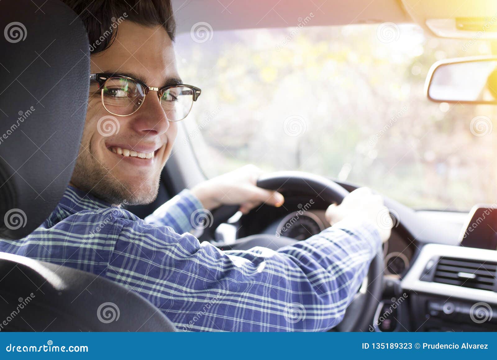 Smiling driving stock image. Image of teenager, grip - 135189323