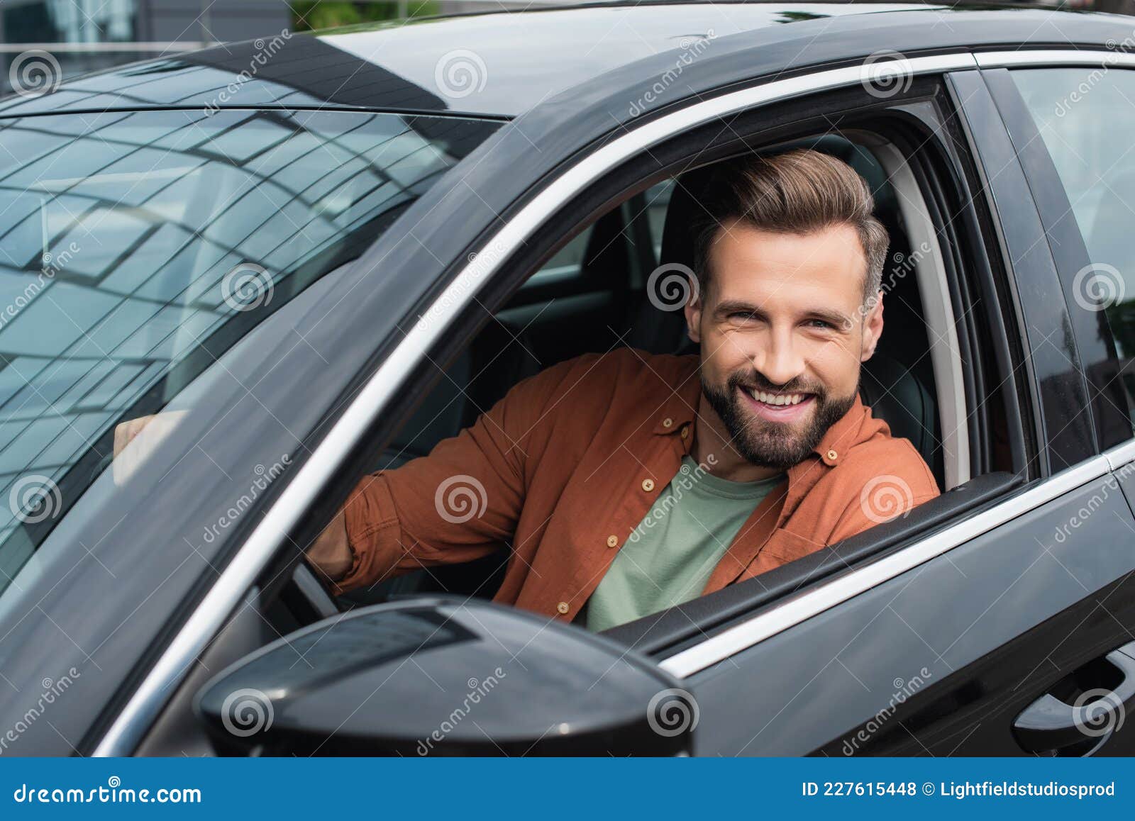 Smiling Driver Looking at Camera in Stock Photo - Image of caucasian ...