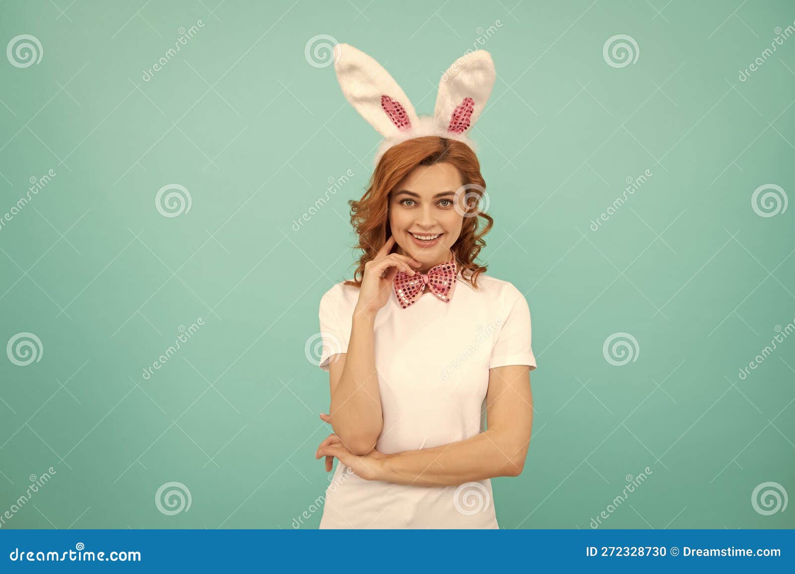 Smiling Easter Woman with Bunny Ears on Blue Background Stock Photo ...