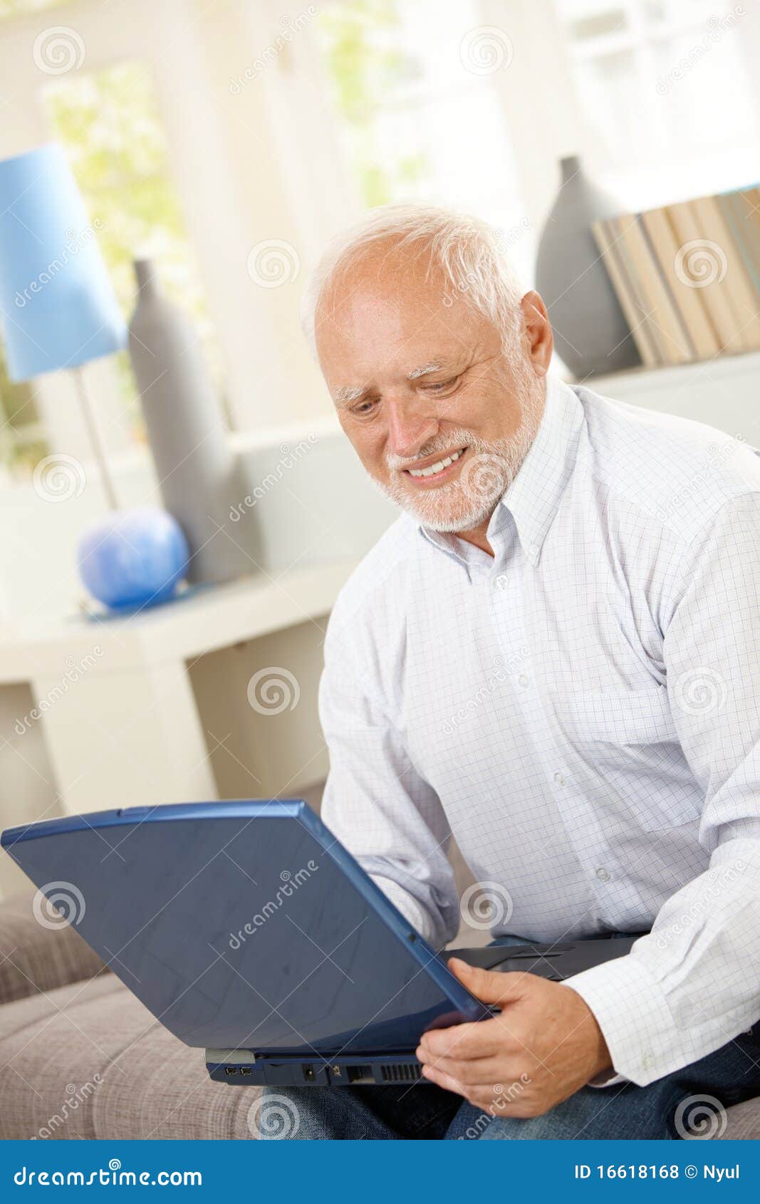 Smiling Elderly Man Looking at Computer Screen Stock Photo - Image of ...