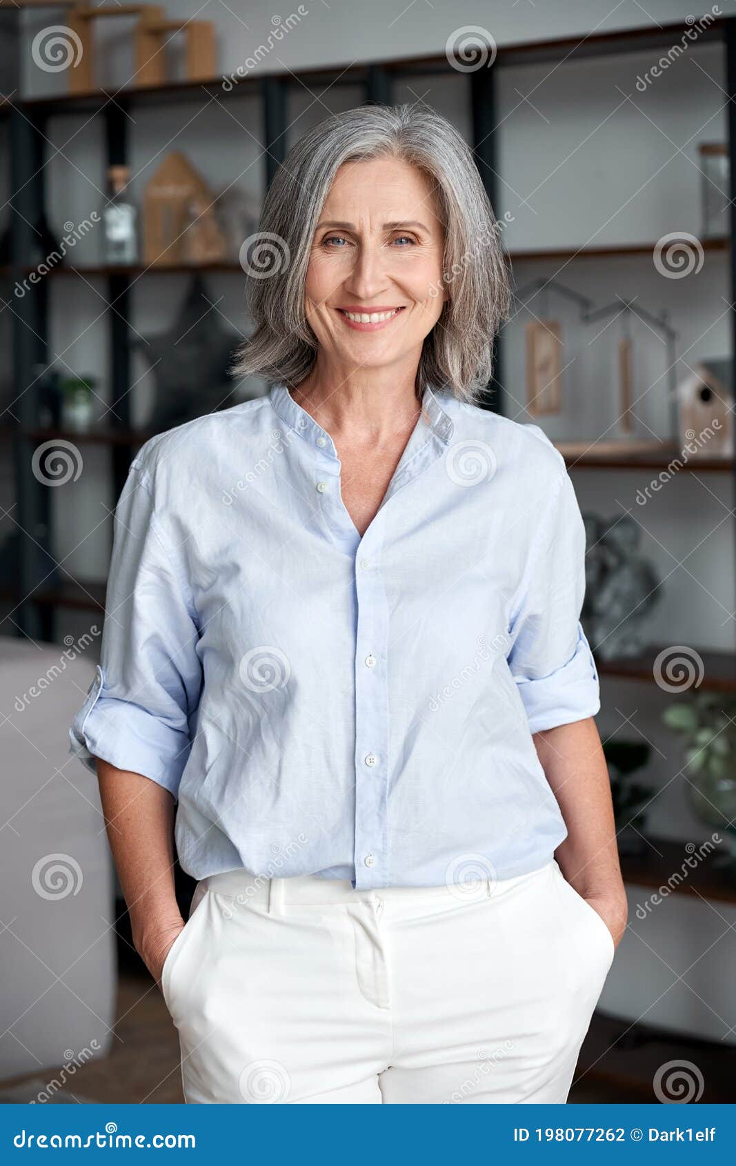 Smiling Elegant Confident Middle Aged Woman Standing in Office ... Smiling Elegant Confident Middle Aged Woman Standing in Office ...