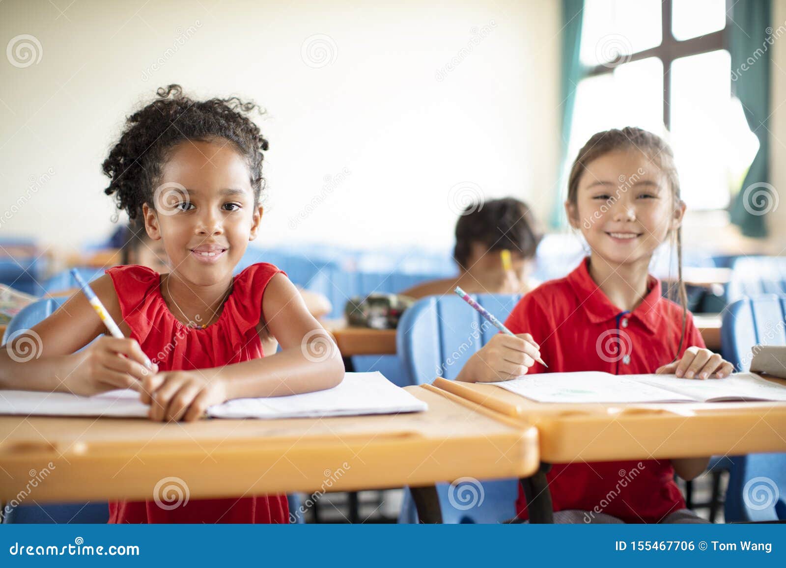 Elementary School Kids in Classroom Stock Photo - Image of education ...