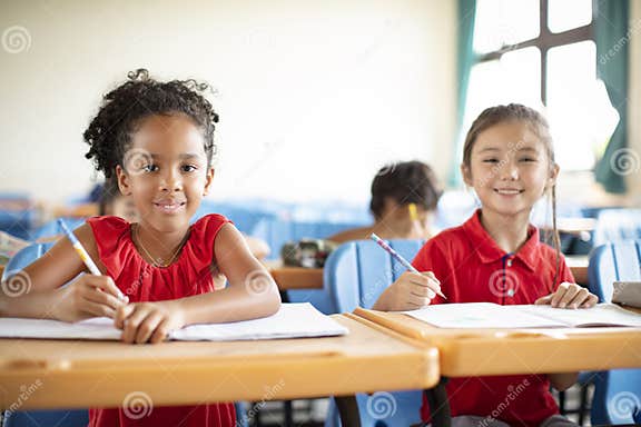 Elementary School Kids in Classroom Stock Photo - Image of education ...