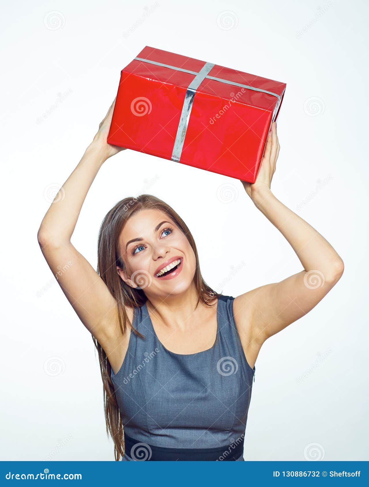 Smiling Emotional Business Woman Hold Gift Box Overhead. Stock Photo ... Smiling Emotional Business Woman Hold Gift Box Overhead. Stock Photo ...
