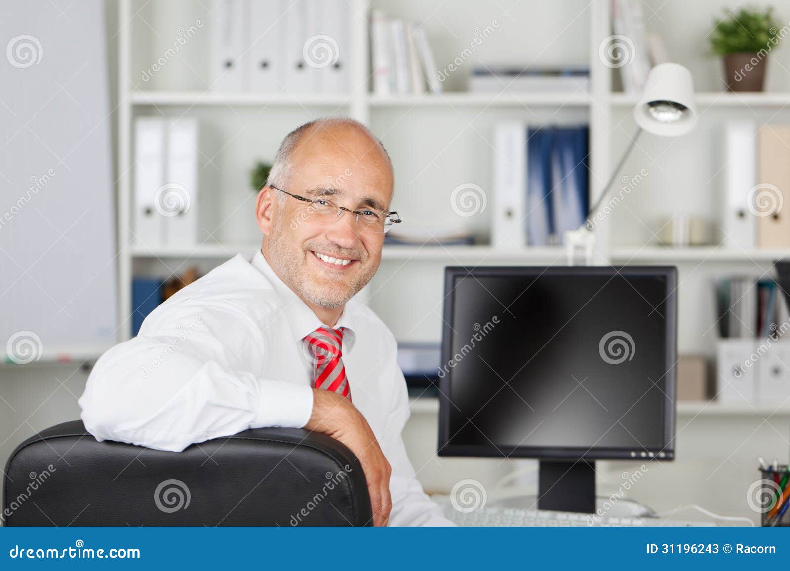 Smiling Employee Looking Back Stock Image - Image of caucasian, glasses ...