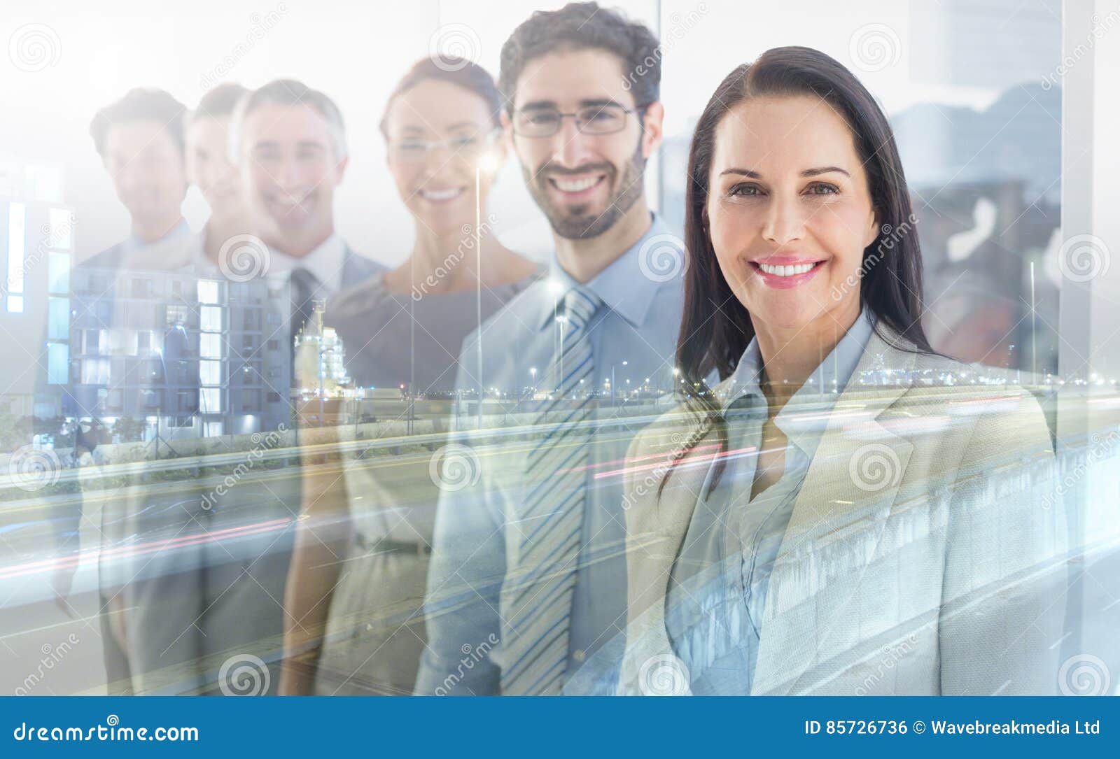 Smiling Employees in a Line Stock Photo - Image of concentrating ...