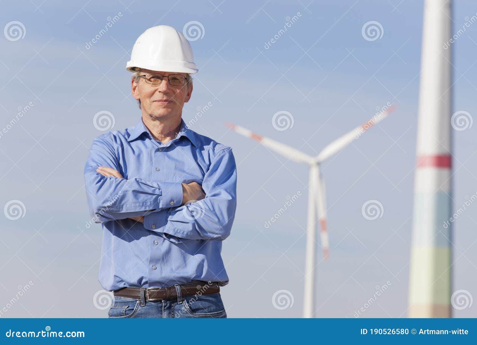 Smiling Engineer with Hard Hat in Front of a Windmill Stock Photo ...