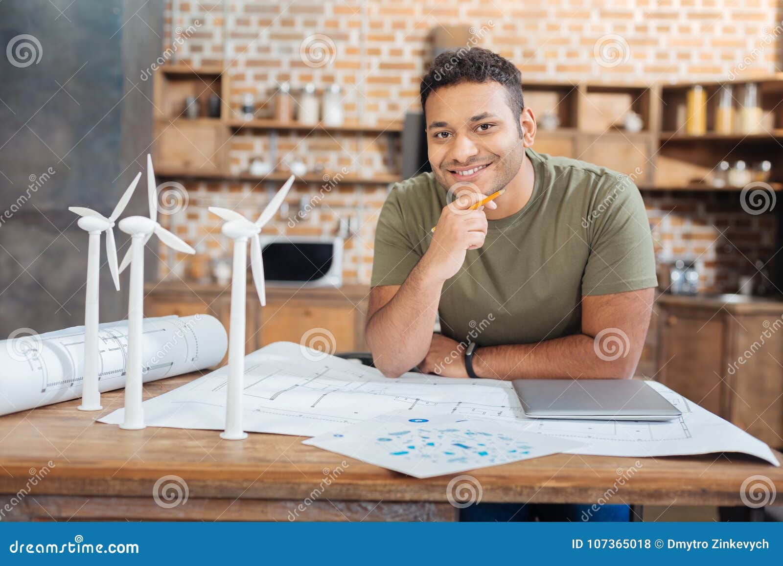 Cheerful Young Engineer Smiling while Standing with a Pencil Stock ...