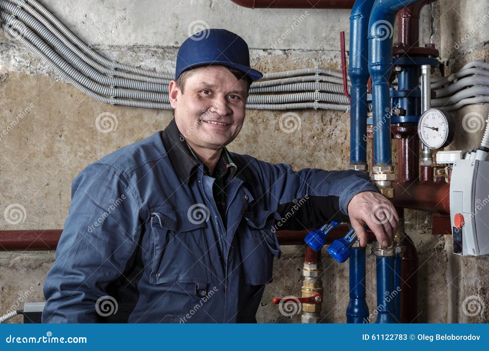 Smiling engineer plumber. stock image. Image of home - 61122783